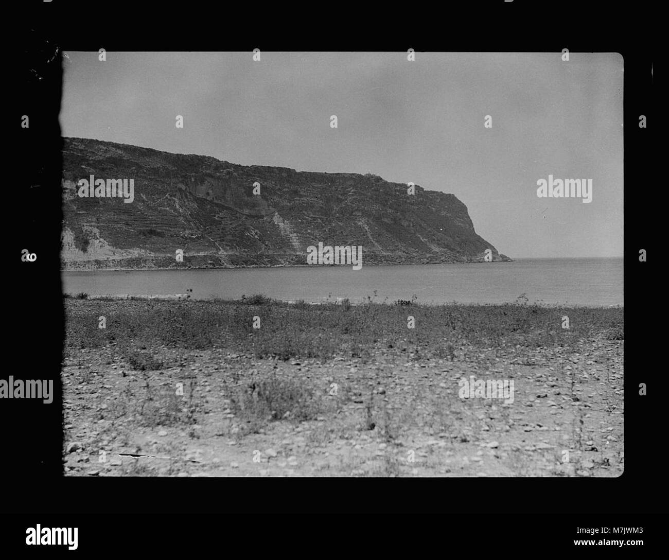 This photograph captures a coastal view of Ras Esh Shekka, located on ...