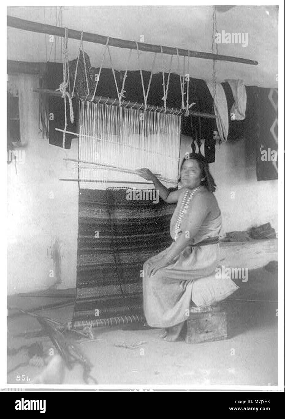 A photograph of a Zuni blanket weaver from the American Southwest ...