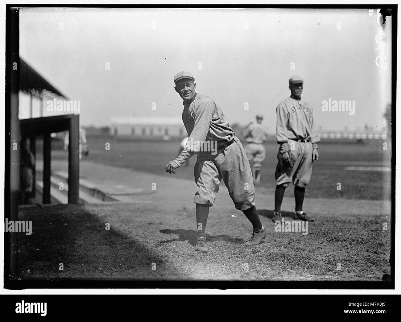 This photograph features professional baseball players from St. Louis ...