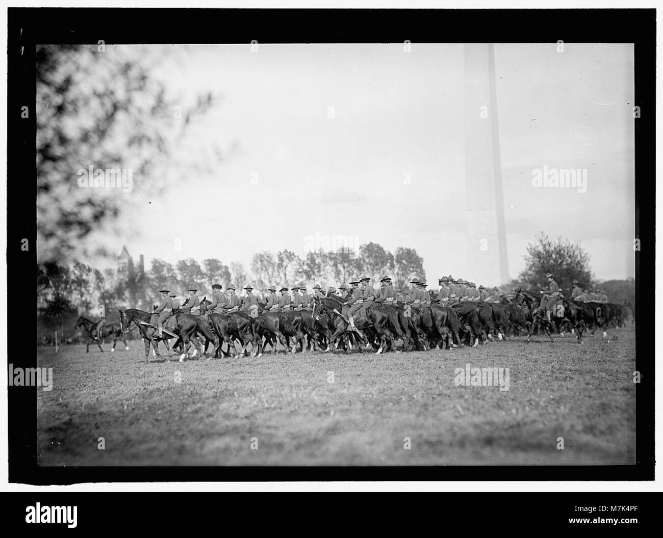 A historical photograph of a cavalry review during President Wilson’s ...