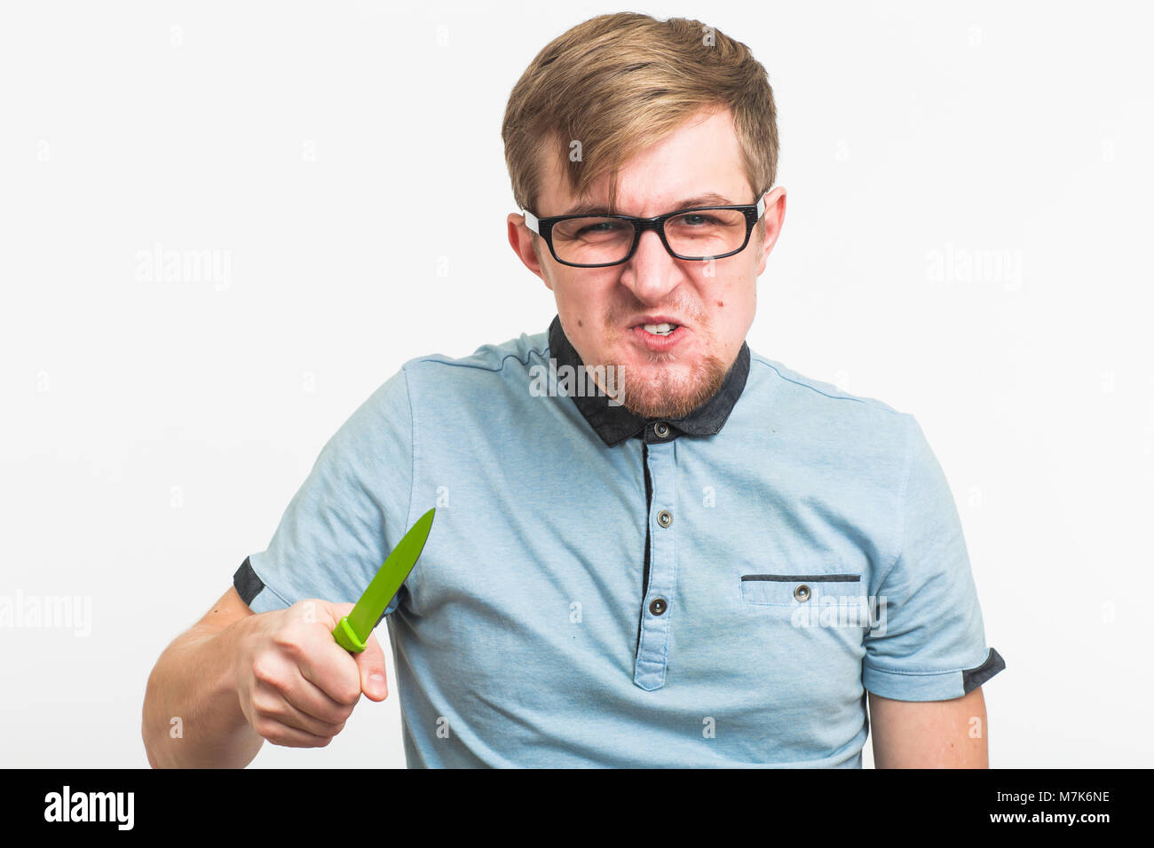 Man attack with knife. Concept of crime and robbery Stock Photo - Alamy