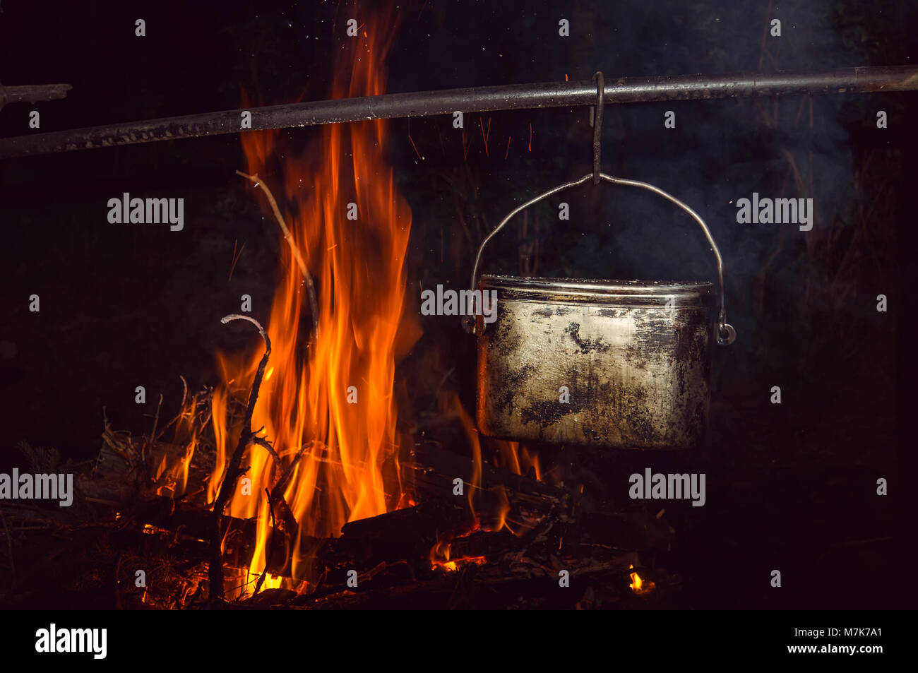 Boiling water on campfire hi-res stock photography and images - Alamy
