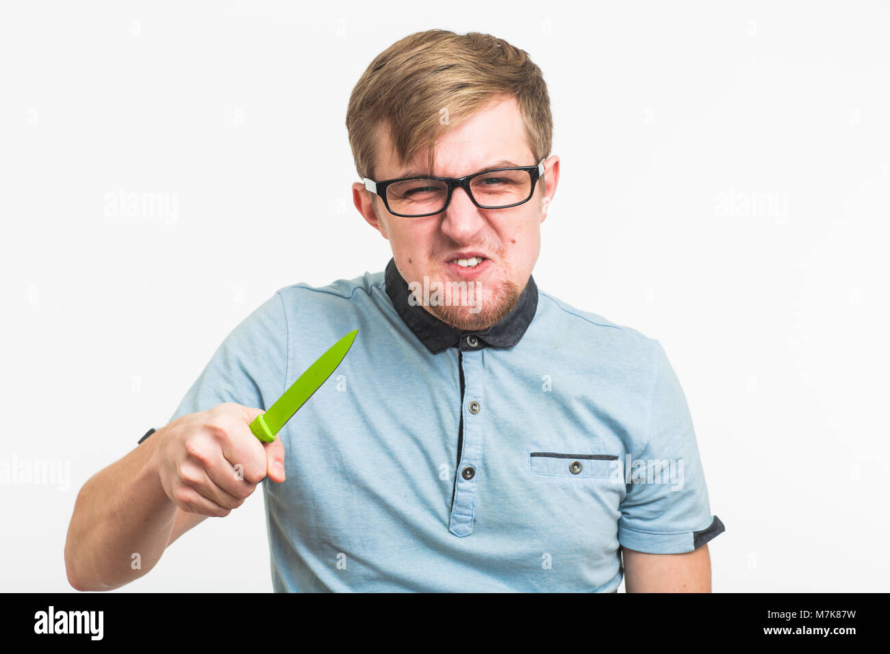Man attack with knife. Concept of crime and robbery Stock Photo - Alamy