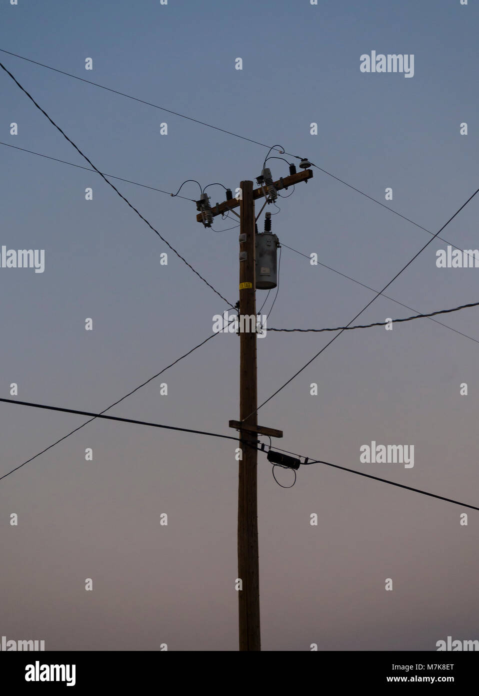 Simple wooden electricity pole Stock Photo - Alamy