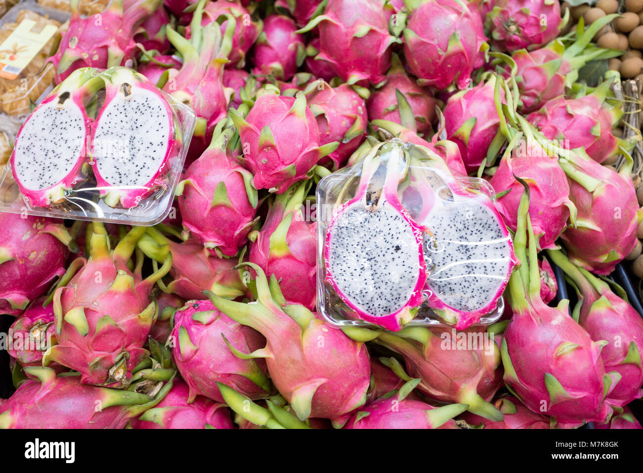 dragon fruit on market shelf Stock Photo - Alamy