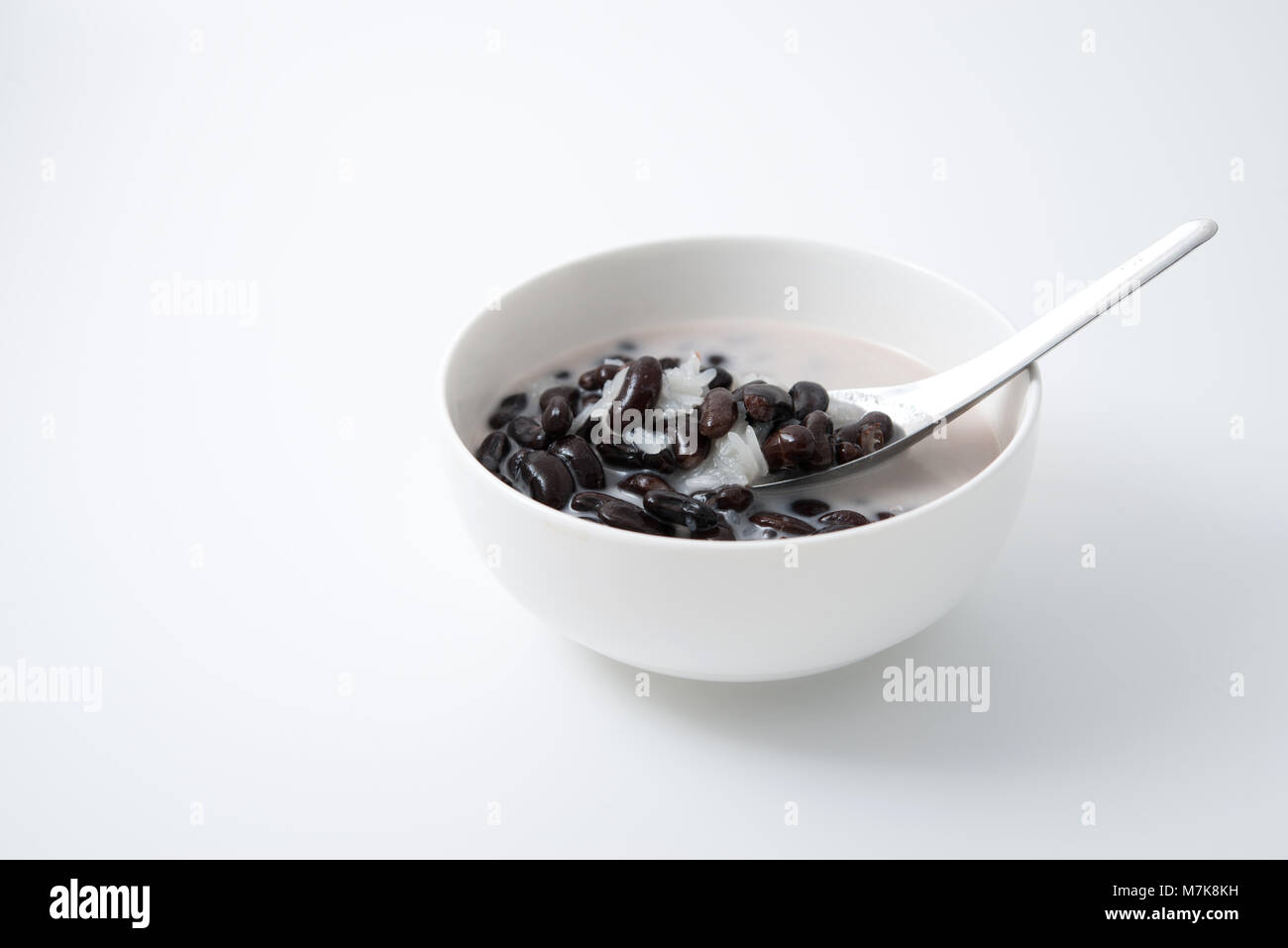 sweet sticky rice & black beans in coconut milk Stock Photo - Alamy