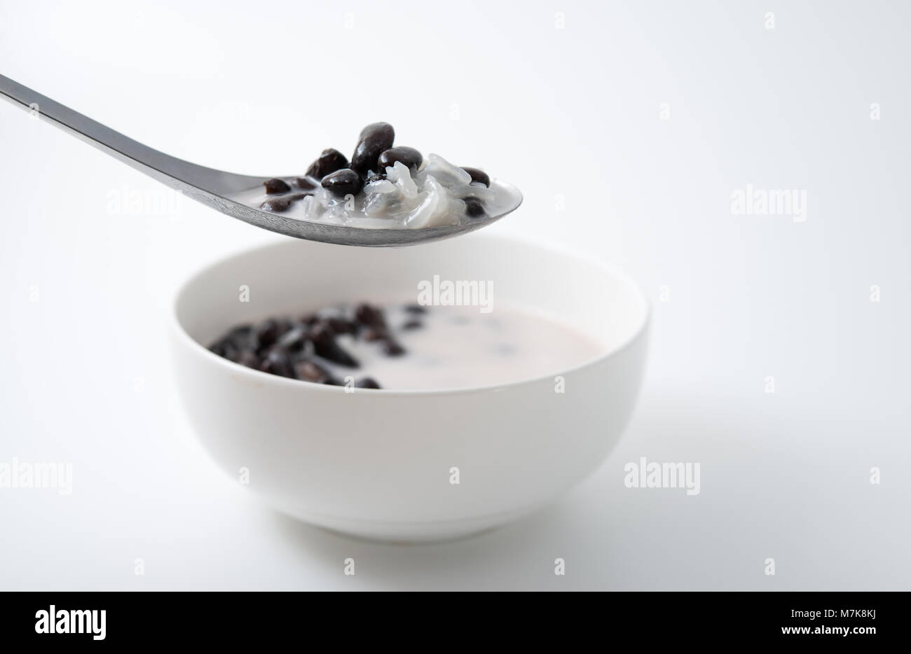 sweet sticky rice & black beans in coconut milk Stock Photo - Alamy