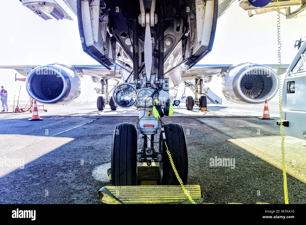 Fueling and final checking aircraft before taking off, view of the wing ...