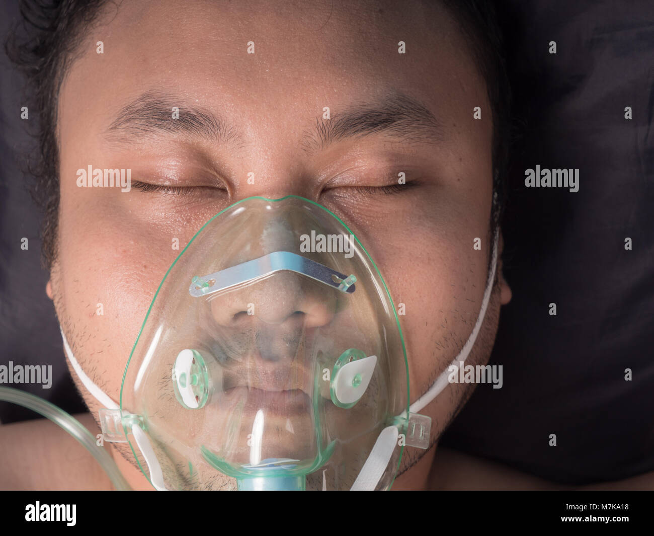 closeup of male patient wearing oxygen mask Stock Photo - Alamy