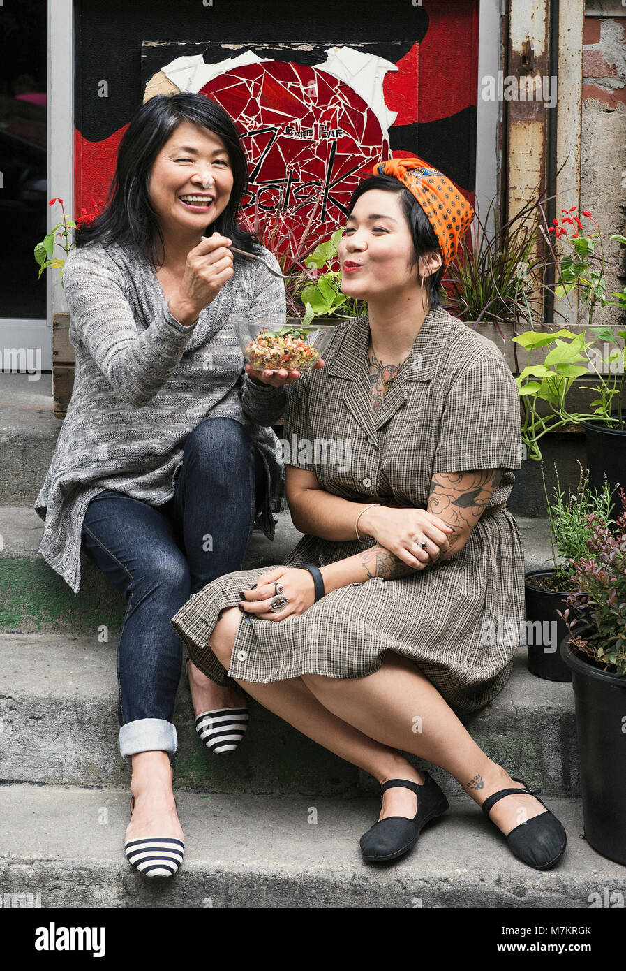Two women eating in restaurant hi-res stock photography and images - Alamy