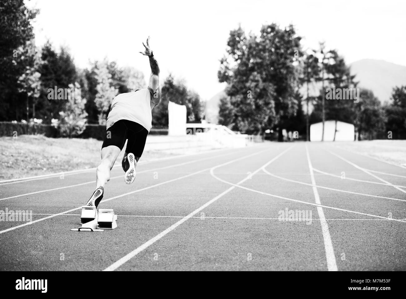 Man running starting position Black and White Stock Photos & Images - Alamy