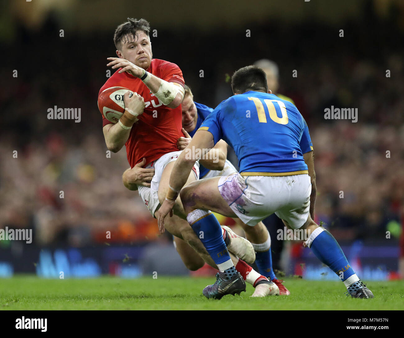 Wales' Steff Evans (left) in action with Italy's Tommaso Allan during ...