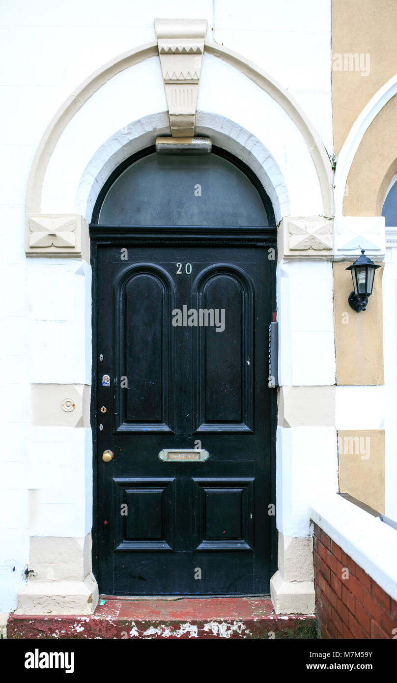 Address number in a wooden door Stock Photo - Alamy