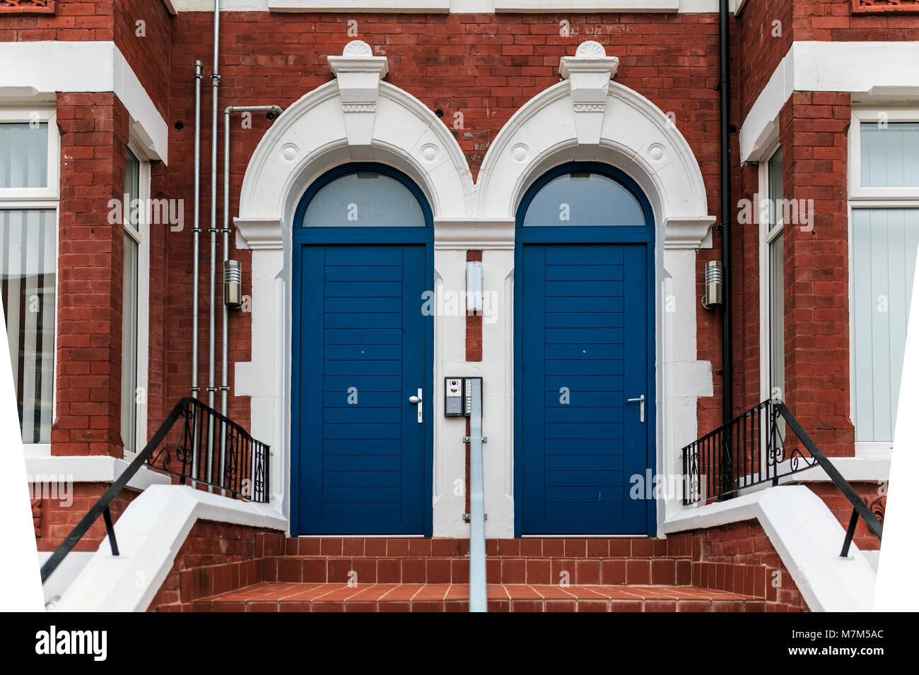Address number in a wooden door Stock Photo - Alamy