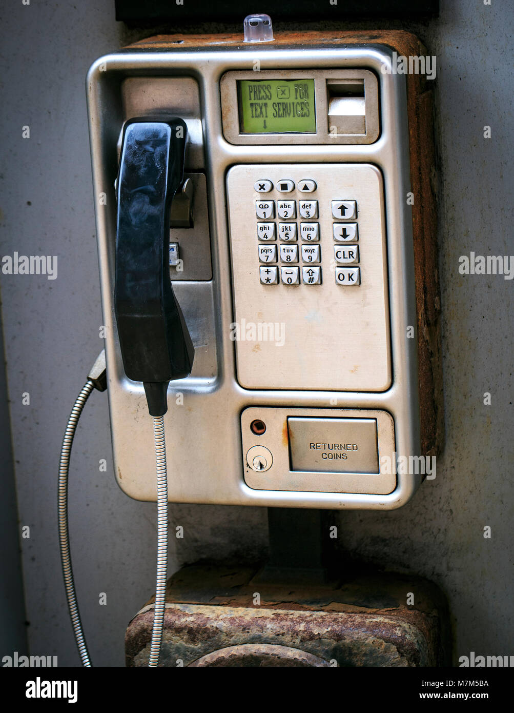 old public telephone console in england Stock Photo - Alamy