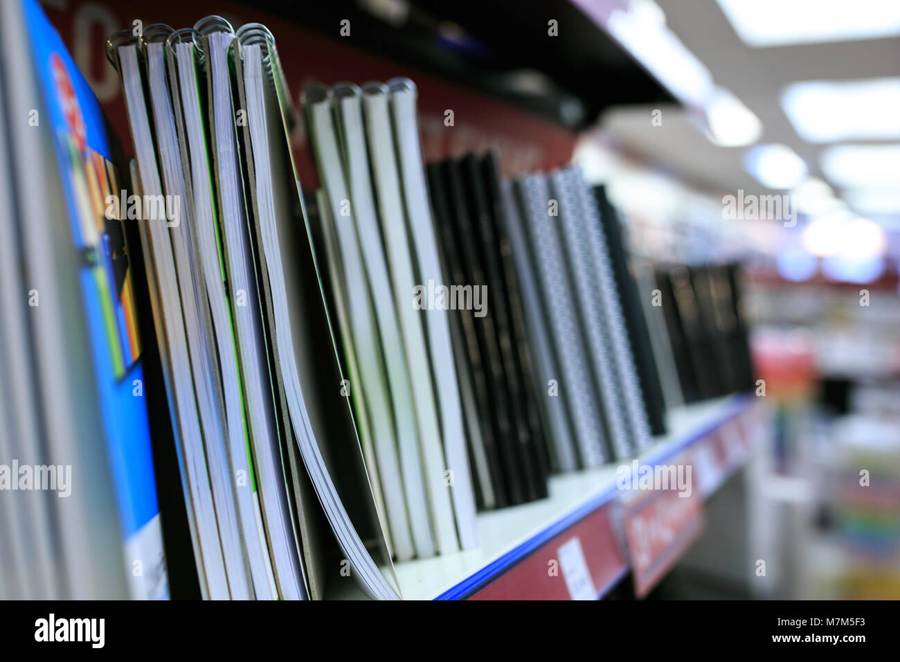 Group of notebooks in a library Stock Photo - Alamy