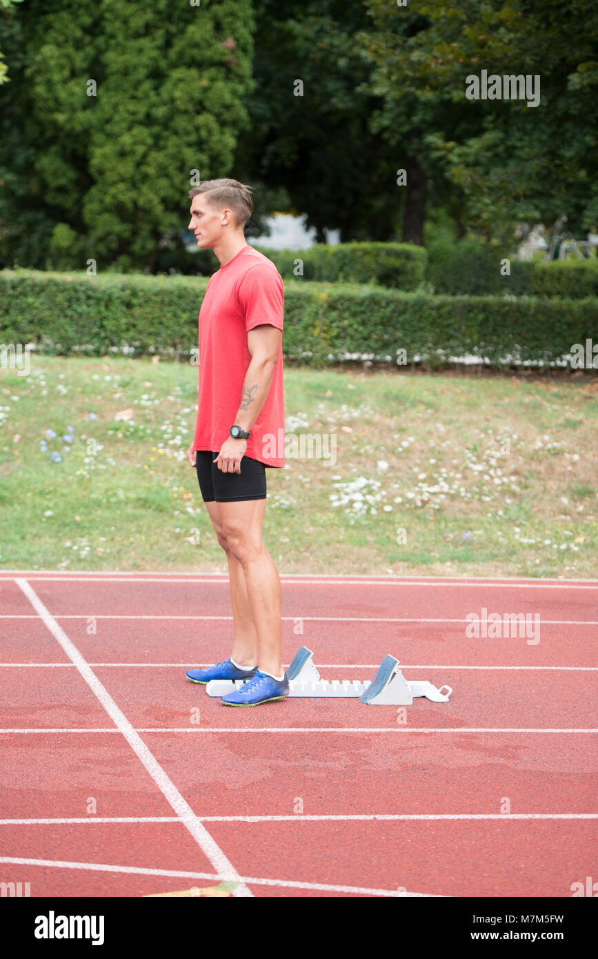 Young Runner Athlete Man Relax and Ready for Run at Athletics Race ...