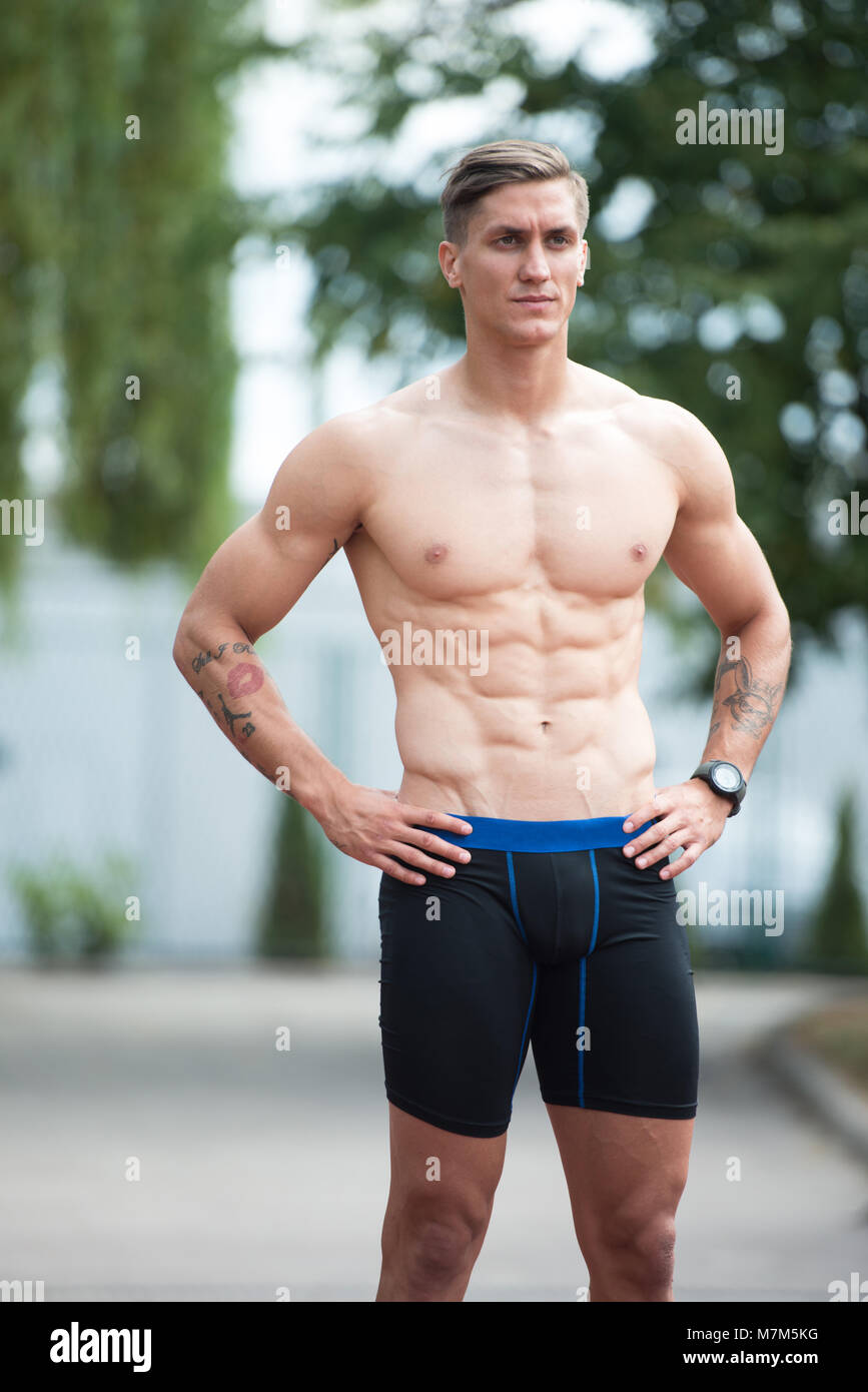 Young Runner Athlete Man Relax and Ready for Run at Athletics Race ...