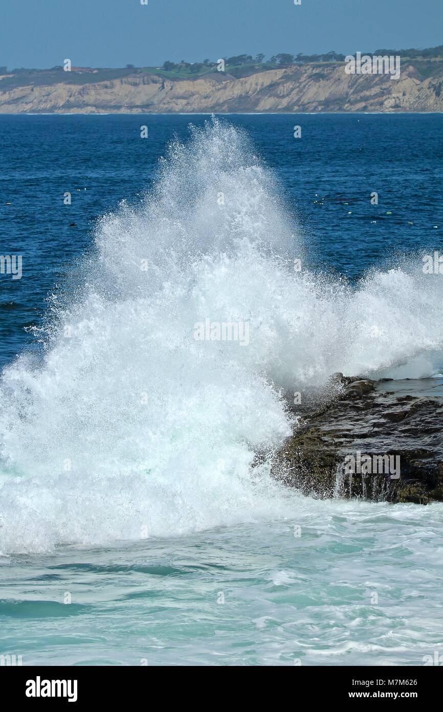 wave crashing on an ocean cliff Stock Photo - Alamy