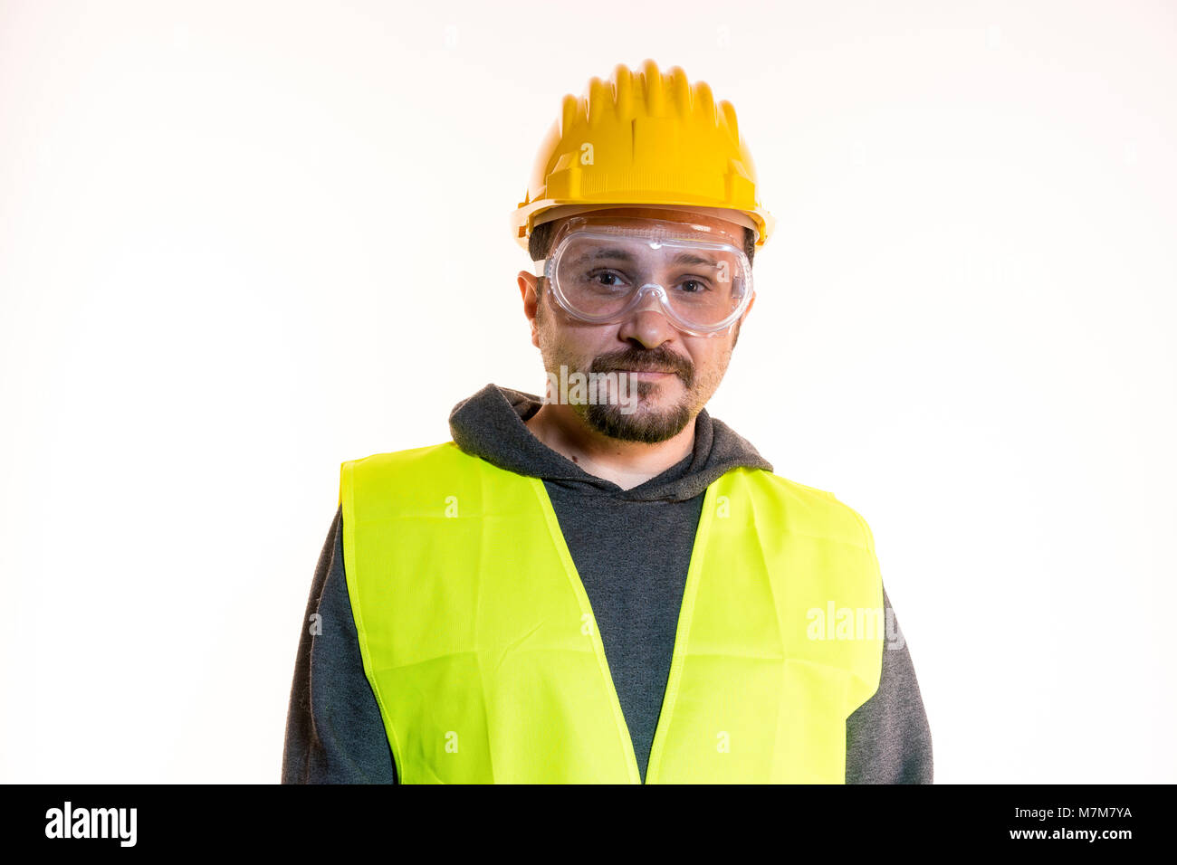 Do it yourself, man dressed in yellow builder helmet with protective ...