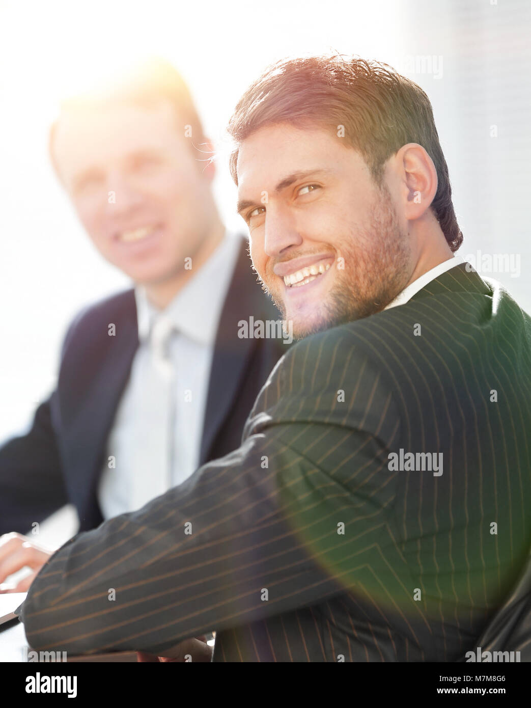 Boss sitting behind desk hi-res stock photography and images - Alamy