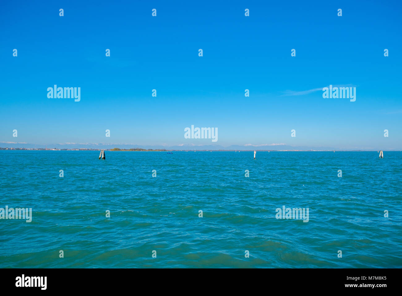 Venice lagoon on a clear blue sky day in Italy Stock Photo - Alamy