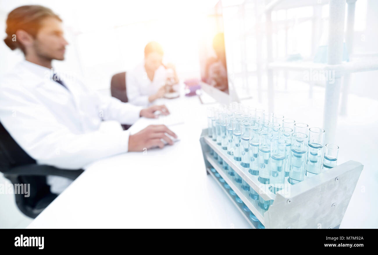 side view of scientists working in laboratory Stock Photo - Alamy