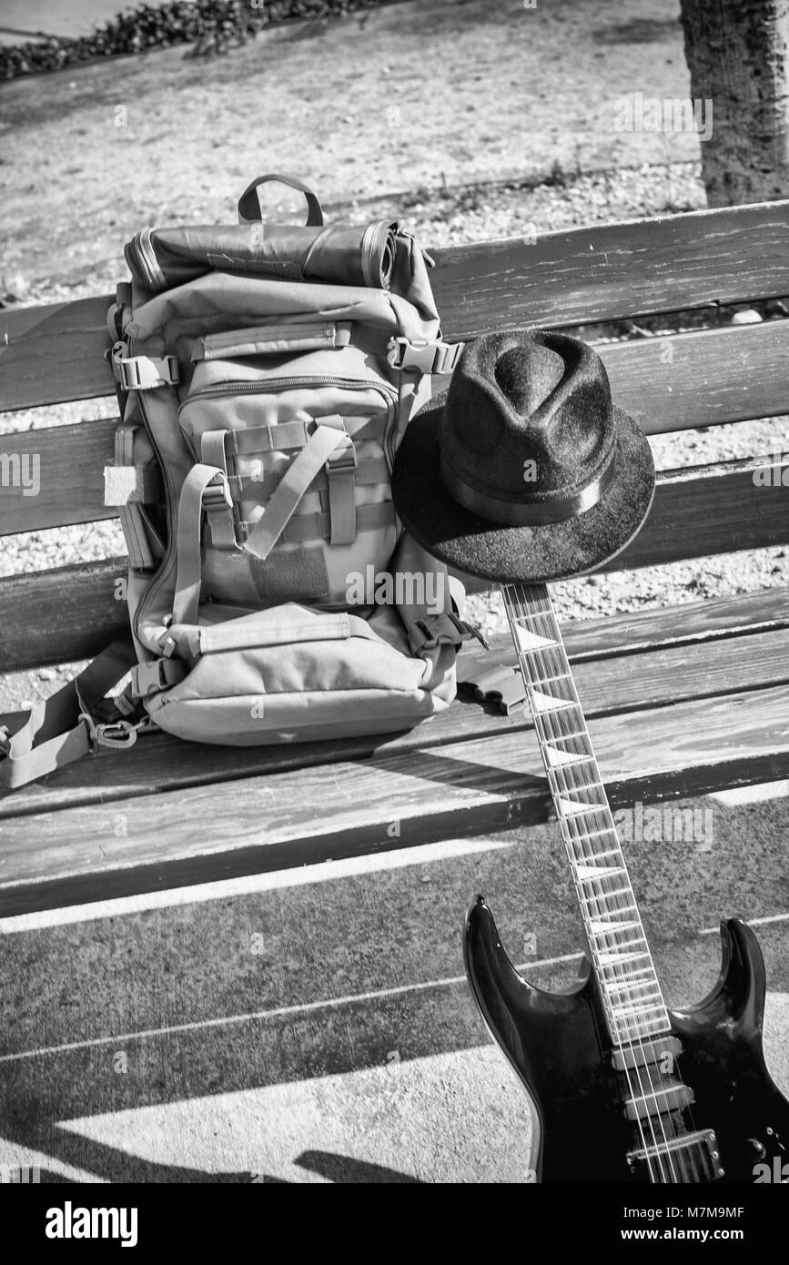 Free tramp lifestyle objects on a park bench Stock Photo - Alamy