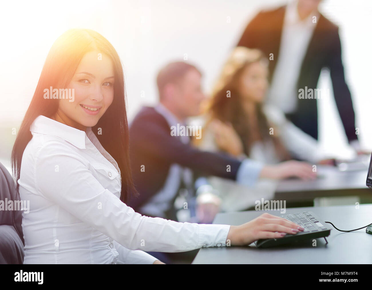 business woman on the background of the office Stock Photo - Alamy