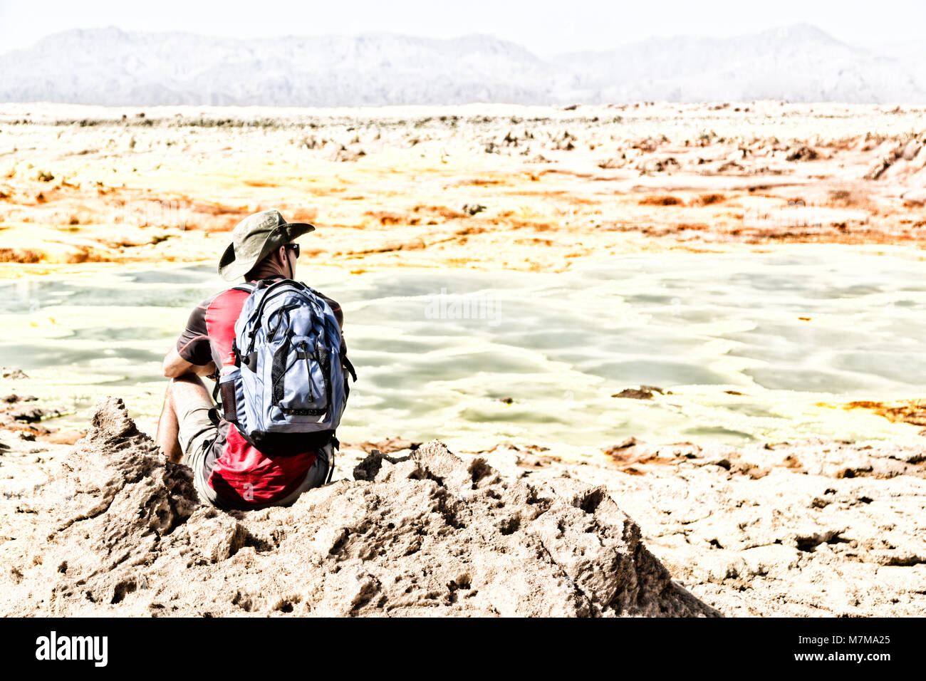 in dalol ethiopia a backpacker near the depression volcano land Stock ...