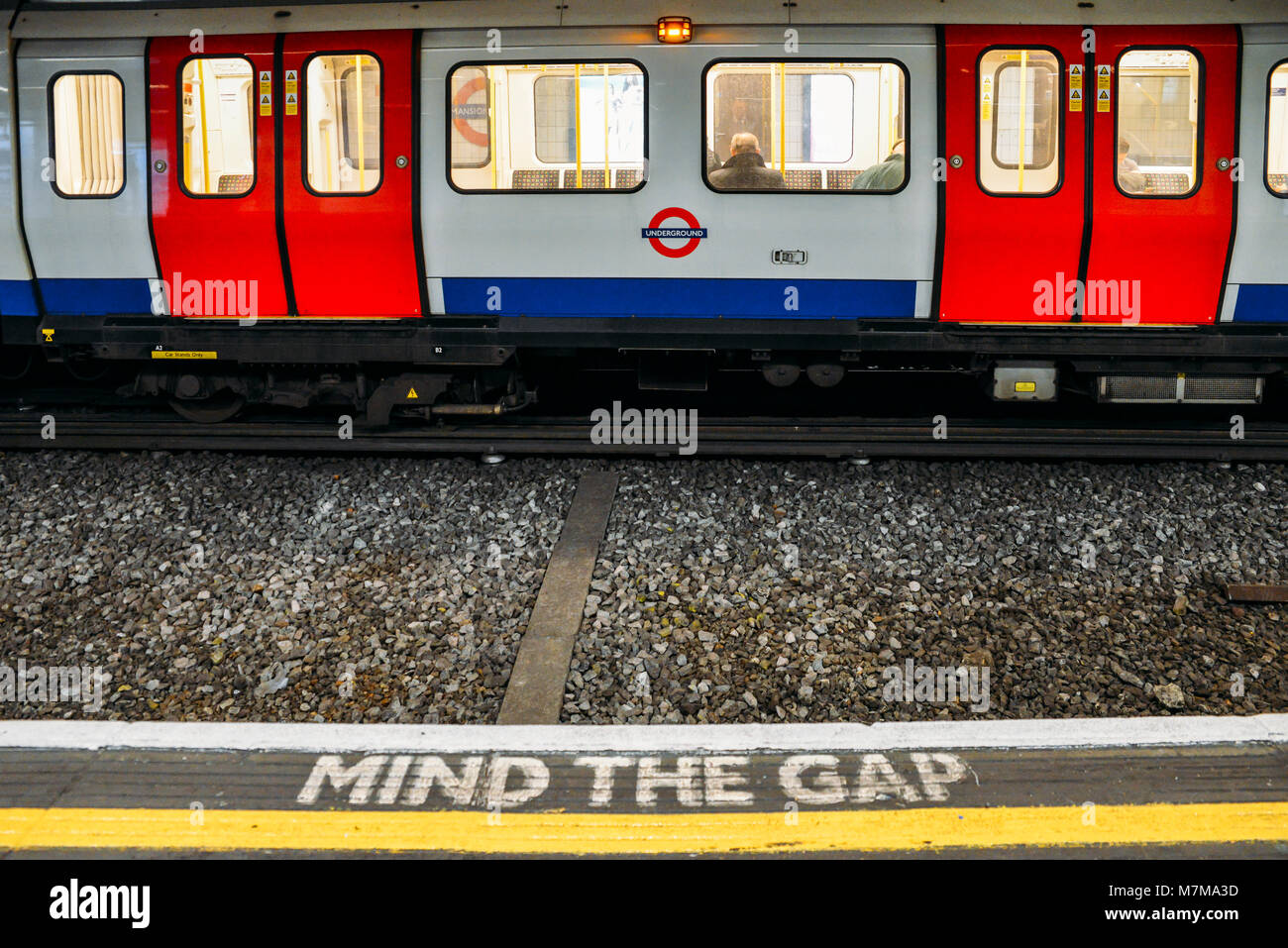 London, UK - March 10, 2018: Mind the gap, warning in the London ...