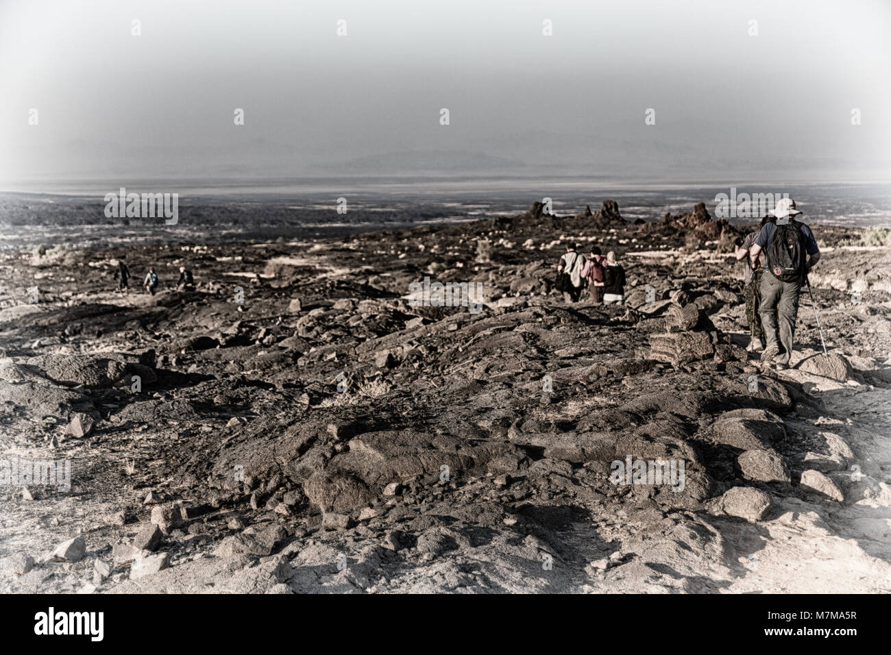 in danakil ethiopia africa the old backpacker people walking in the ...
