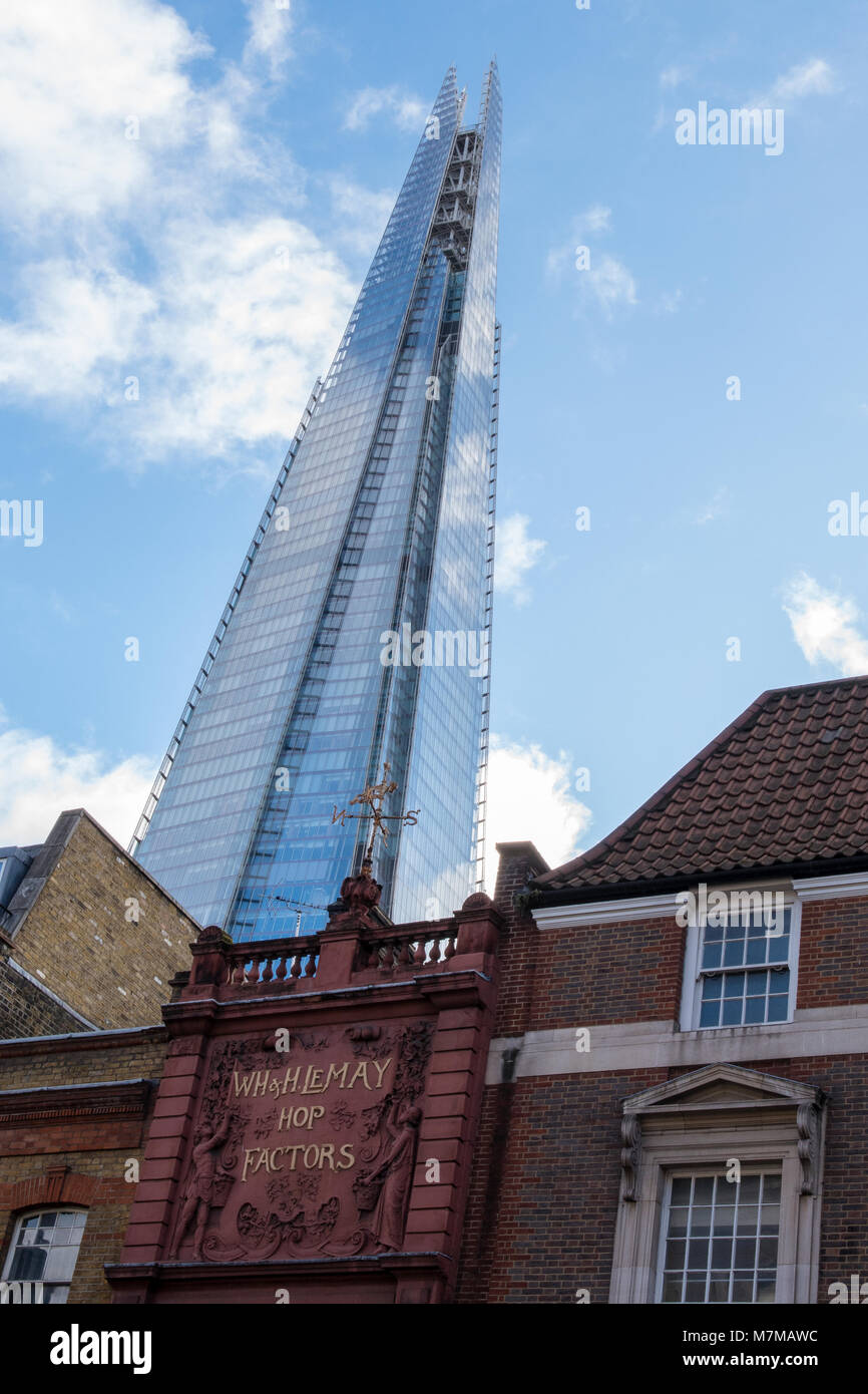 a different or unusual atmospheric view of the shard office building in ...