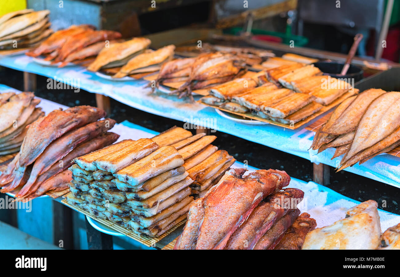 Fried fish at the stall in fish market, Jagalchi in Busan, South Korea ...