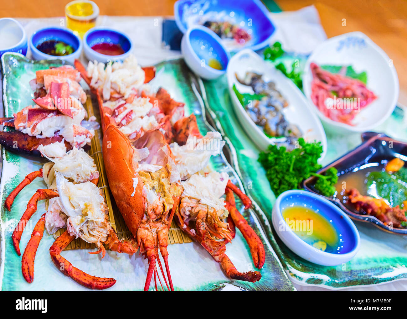 Lobster and traditional Korean food served in a restaurant in Busan ...