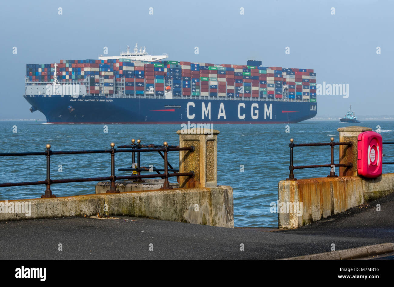a large massive container ship entering or leaving the port of ...