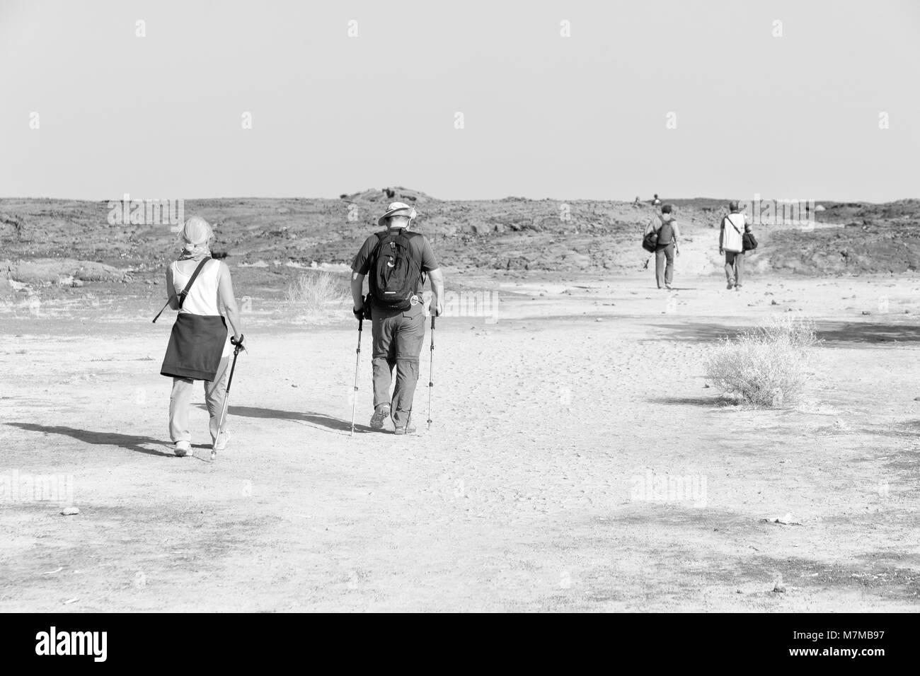 in danakil ethiopia africa the old backpacker people walking in the ...