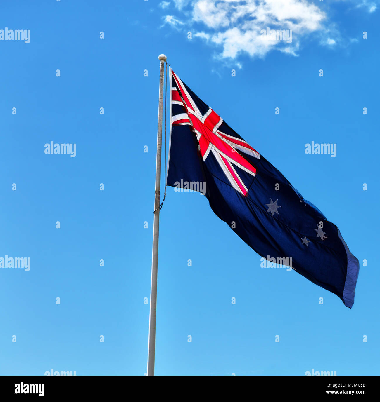 australia in the clear sky the waving flag Stock Photo - Alamy