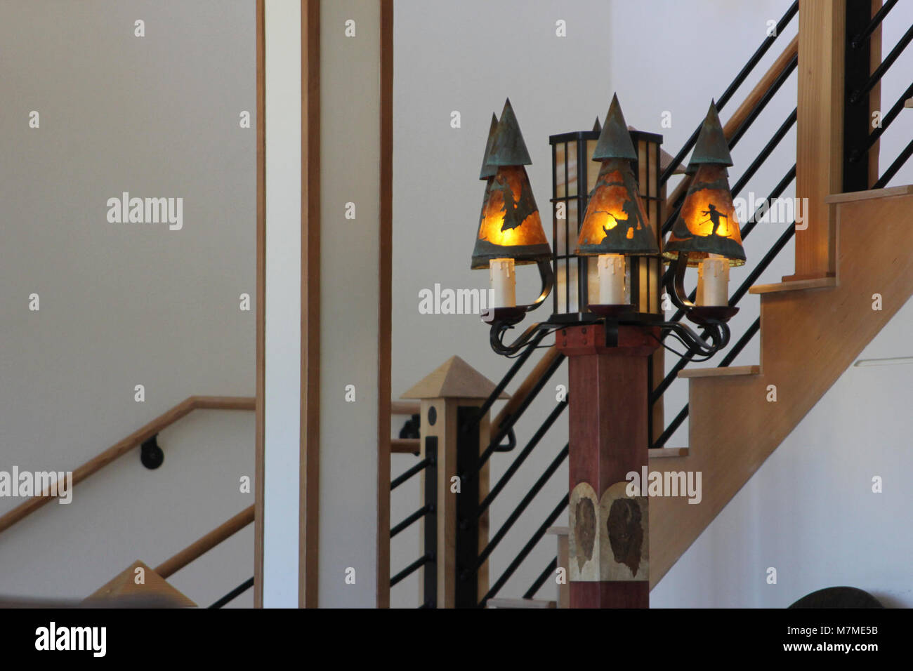 Old faithful snow lodge indoor light fixture hi-res stock photography ...