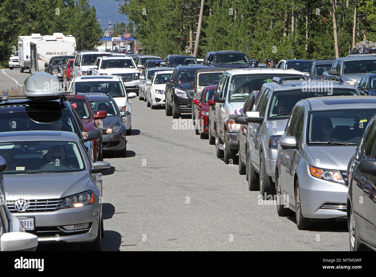 West Entrance in July Vehicles lined up at West Entrance to Yellowstone ...