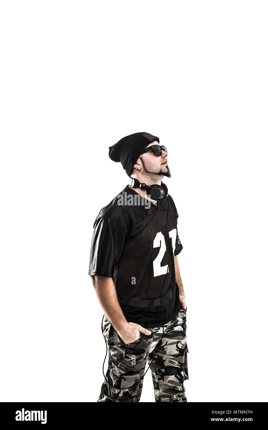 emotional and charismatic DJ - rapper with headphones on a light Stock ...