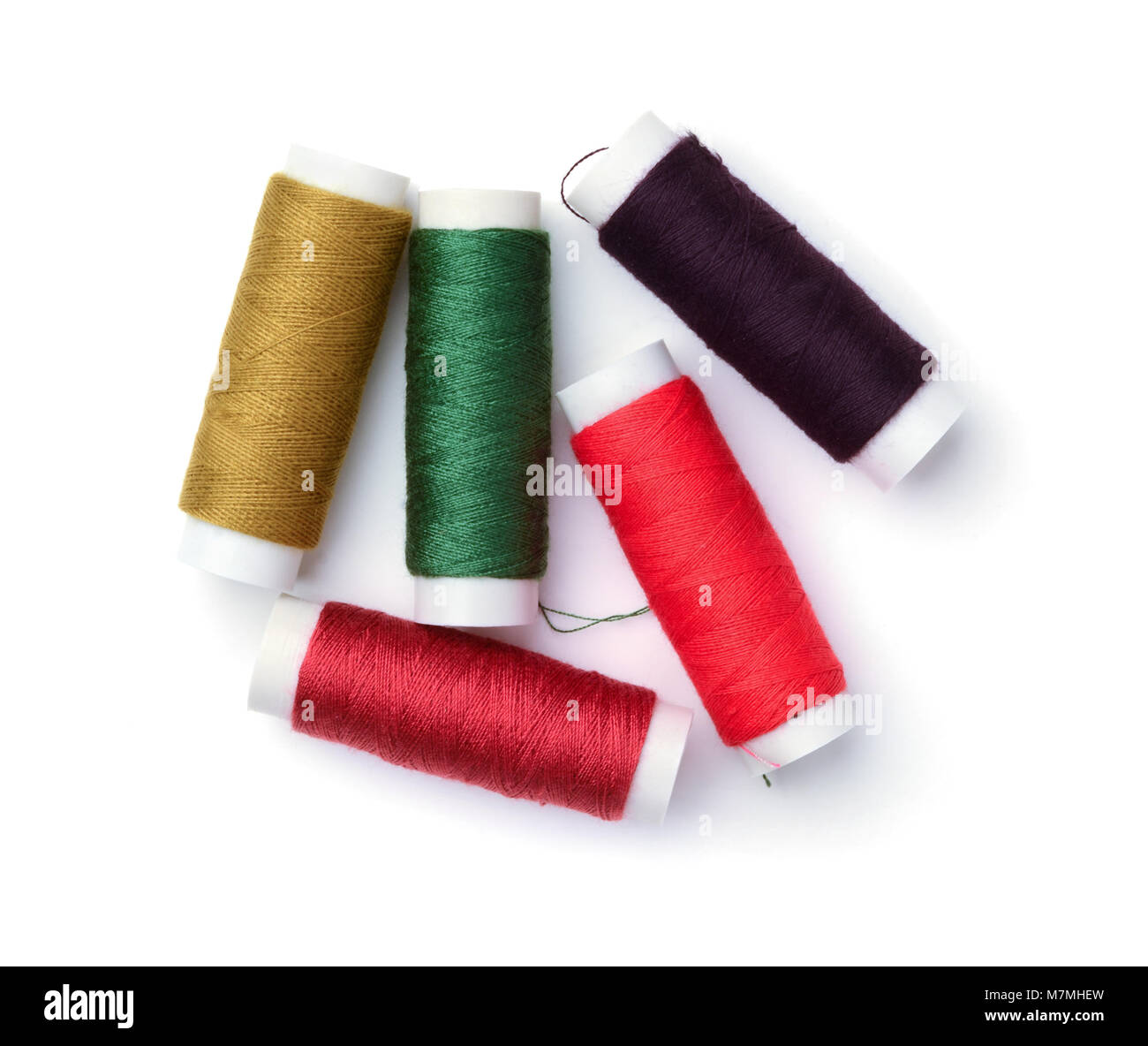 Multicolored threads isolated on white background Stock Photo - Alamy