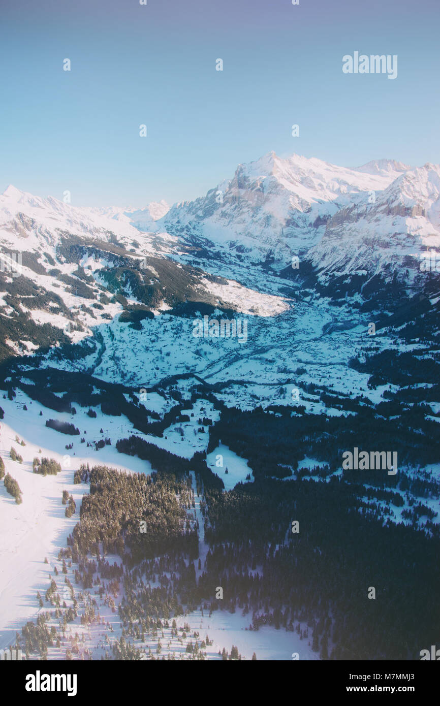 Grindelwald valley and Jungfrau, Eiger, Monch Mountain peaks in winter ...