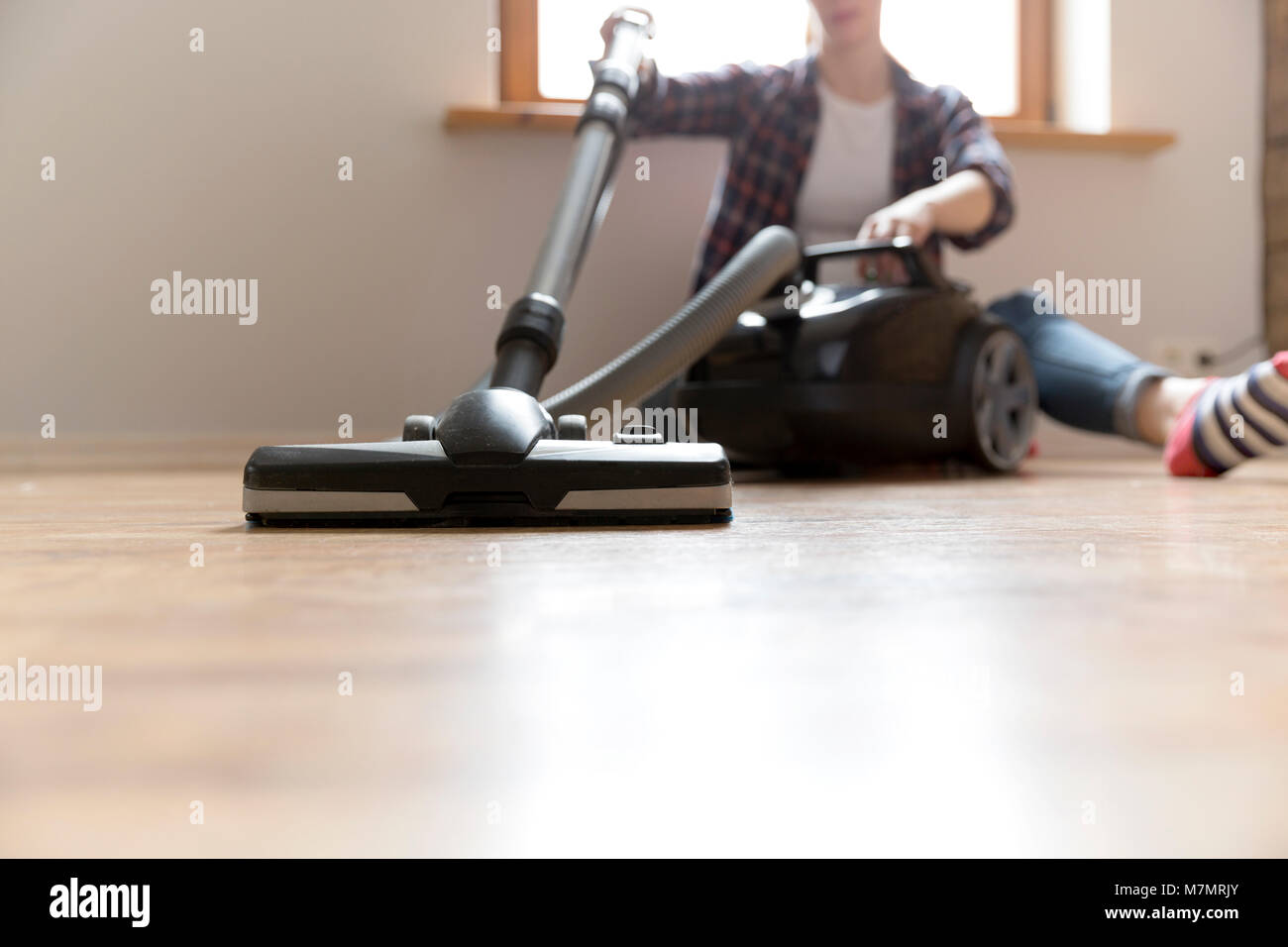 People, housework and housekeeping concept - happy woman with vacuum ...
