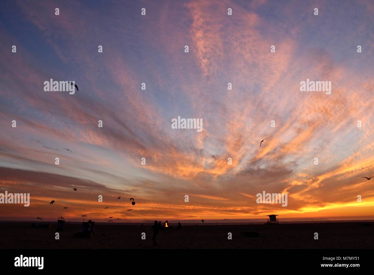 Colorful beach sunset clouds hi-res stock photography and images - Alamy