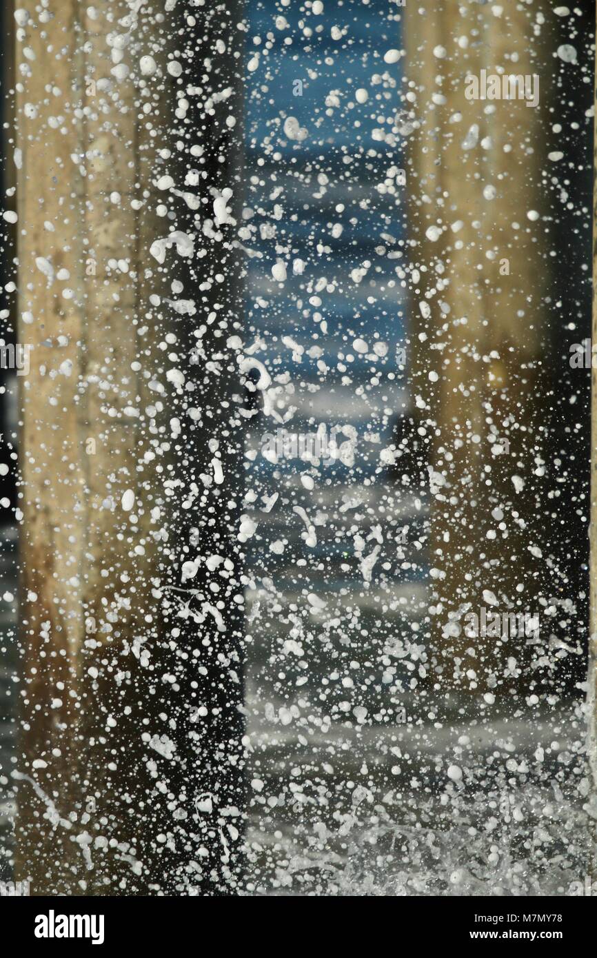 waves crashing on pier pilings Stock Photo - Alamy