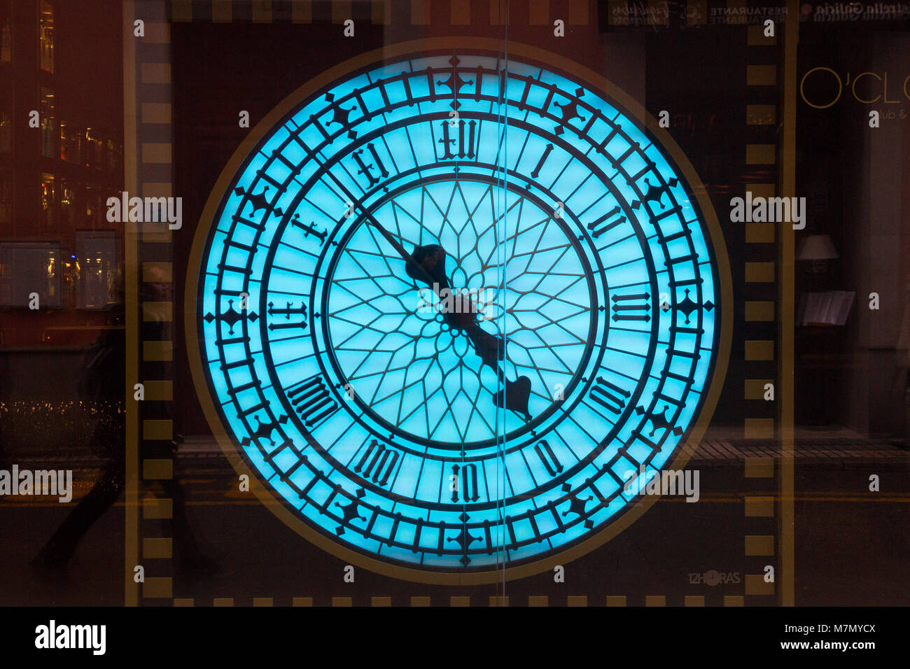 Blue face clock hi-res stock photography and images - Alamy