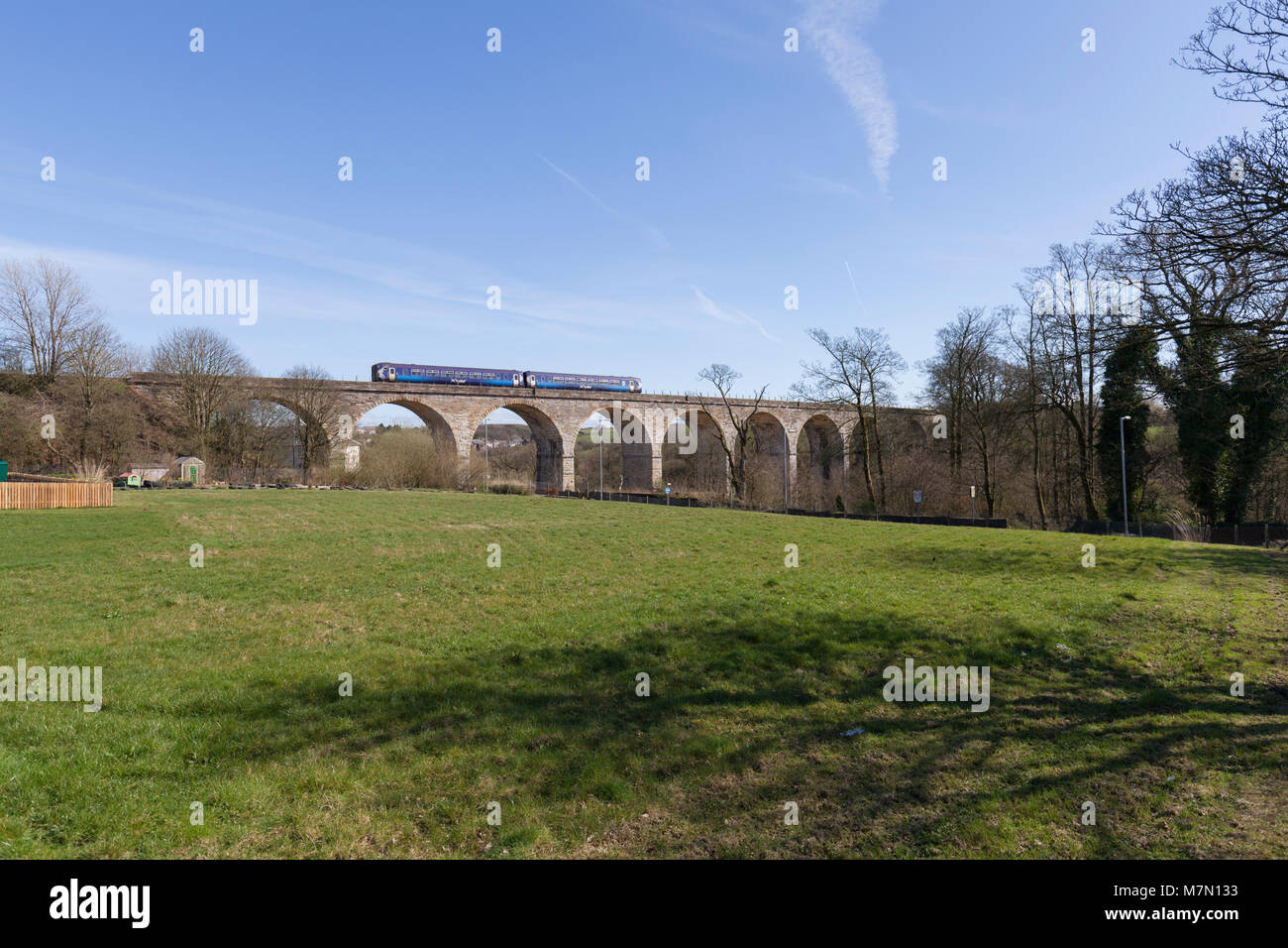 A Scotrail class 156 sprinter train crosses the viaduct at Stewarton ...