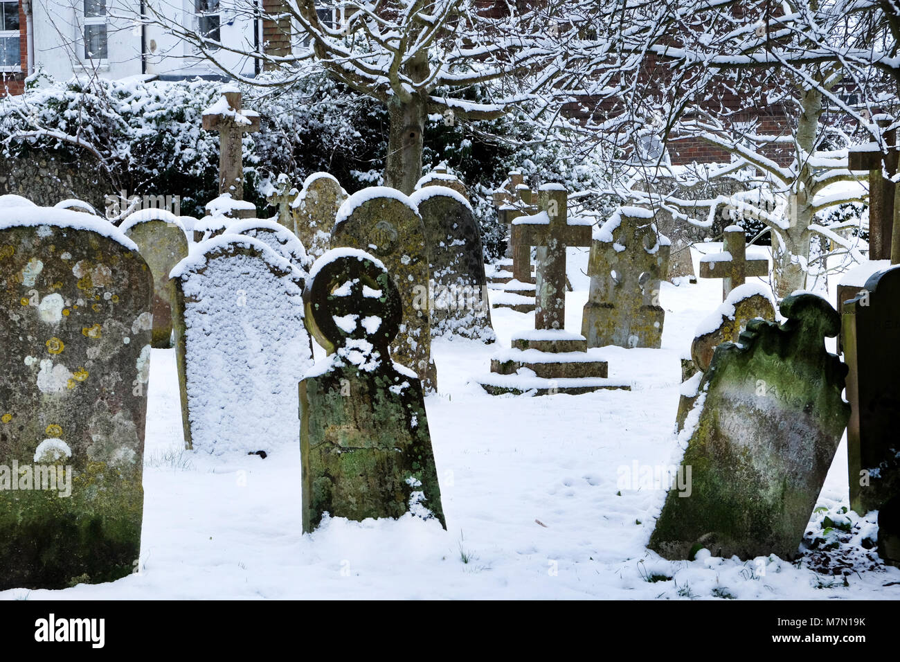 snow scene Grave yard, graves and headstones in the white snow, Ringmer ...