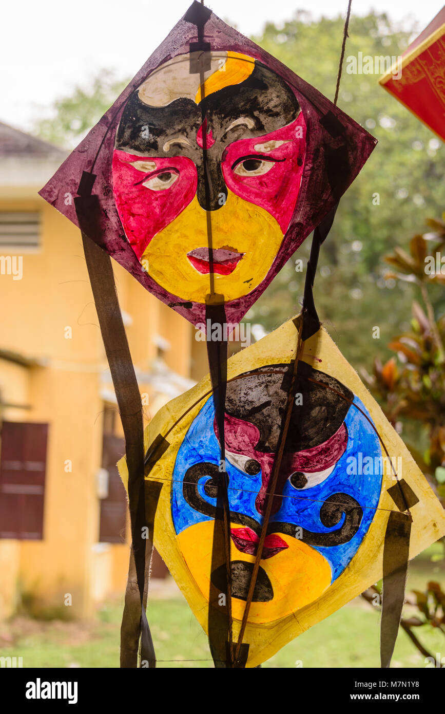 Paper kites made by local children, featuring faces to ward off evil ...